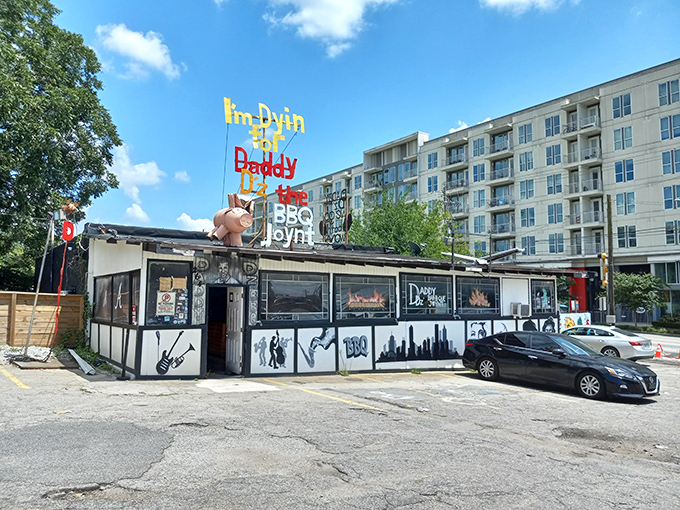 Welcome to BBQ paradise! This unassuming exterior hides a world of smoky delights, proving you can't judge a book by its cover—or a restaurant by its siding.