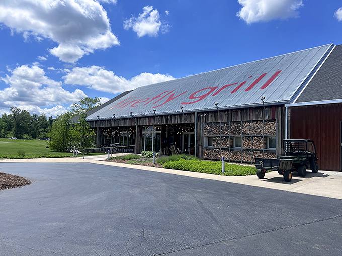 Barn-chic meets culinary magic! Firefly Grill's exterior promises a feast for the senses, with its rustic charm and inviting woodpile. Who knew fine dining could look so cozy?