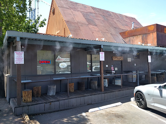 Welcome to burger paradise! The Chuckbox's rustic exterior is like a time machine disguised as a shack, promising mesquite-grilled delights inside.