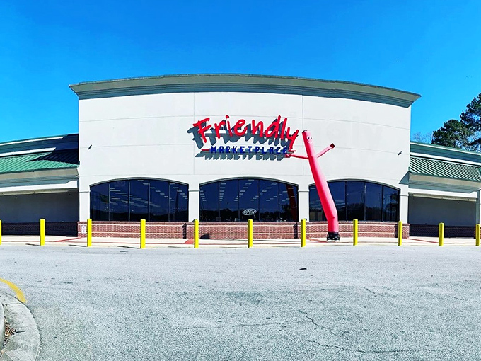 Welcome to bargain heaven! This cheerful yellow facade promises a treasure trove of deals inside, where your wallet can breathe a sigh of relief.
