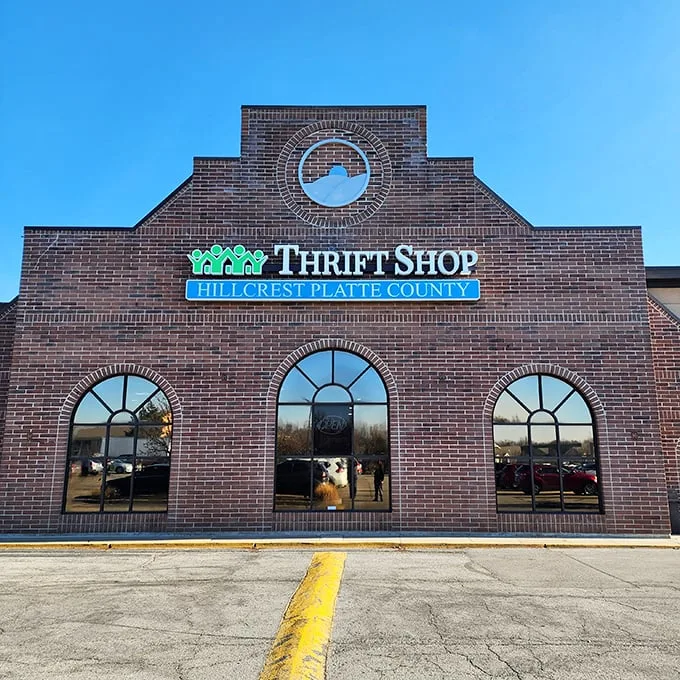 Welcome to bargain heaven! Hillcrest Thrift Shop's brick facade promises treasures within, like a modern-day Ali Baba's cave for the budget-conscious adventurer.