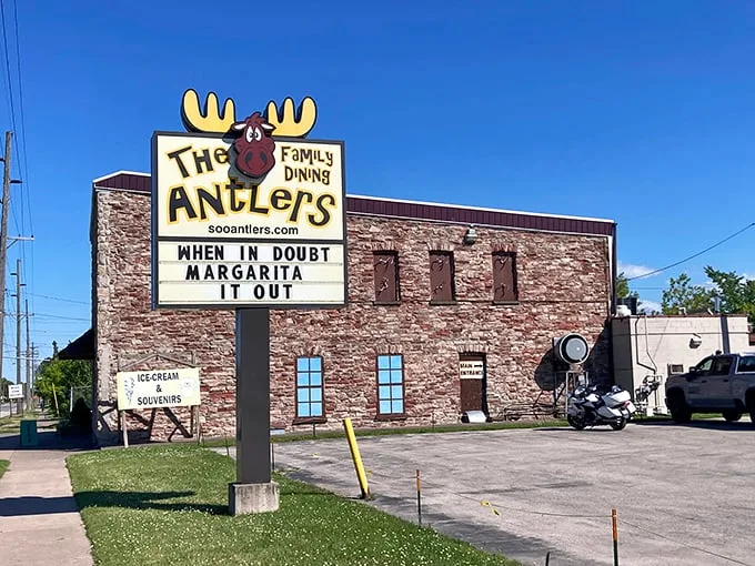 "When in doubt, margarita it out!" This stone fortress of flavor beckons with a sign that's part wisdom, part invitation. Who knew antlers could be so welcoming?