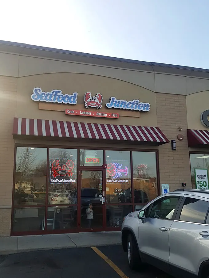Welcome to Seafood Junction, where the red and white awning beckons like a lighthouse guiding you to delicious waters!
