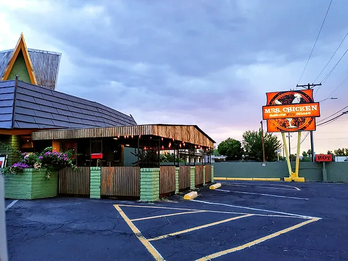 Welcome to Mrs. Chicken, where the A-frame roof isn't just for show – it's a beacon of crispy, juicy hope in the Arizona desert.
