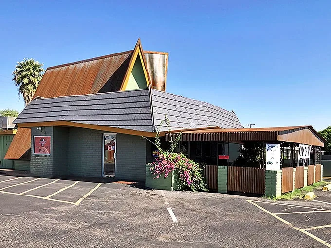 Welcome to Mrs. Chicken, where the A-frame roof isn't just for show – it's a beacon of crispy, juicy hope in the Arizona desert.