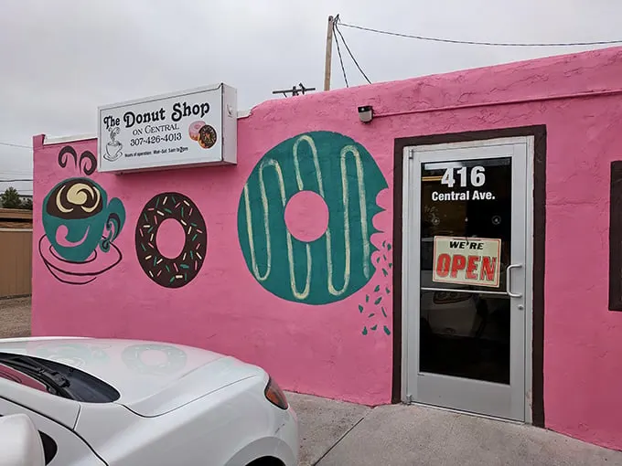 A pink paradise that's more eye-catching than a rodeo clown! This donut shop's exterior is a delightful feast for the eyes and a promise of sweet treats within.