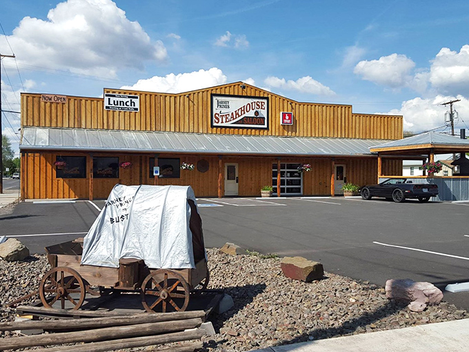 Welcome to beef paradise! Barney Prine's rustic exterior promises a steak-lover's dream, with those red umbrellas beckoning like beacons of deliciousness.