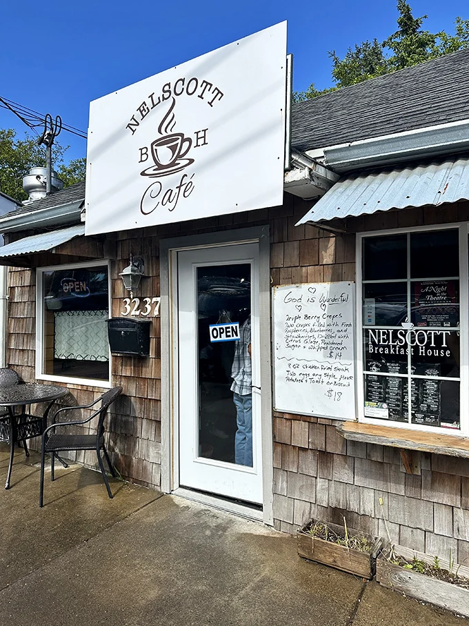 Quaint charm meets culinary magic! This cozy shingle-clad café looks like it was plucked straight from a Norman Rockwell painting, promising comfort food with a side of nostalgia.