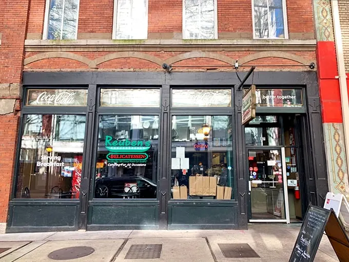 Welcome to sandwich paradise! Reuben's Deli's classic storefront promises a journey through flavor town, with a side of Atlanta charm.