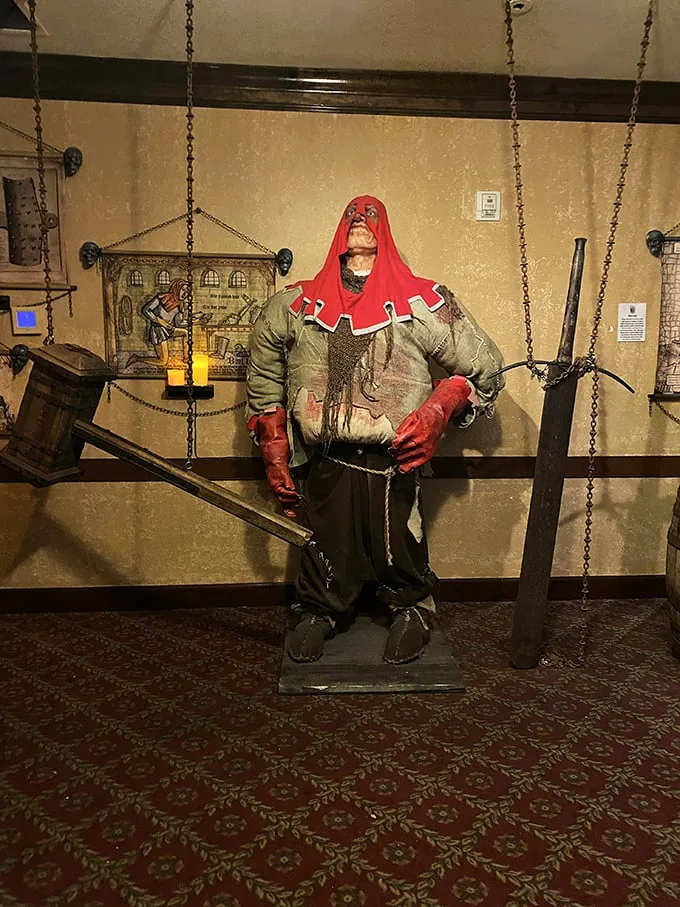 Welcome to the house of horrors! This menacing figure greets visitors, setting the tone for a journey through humanity's dark past.