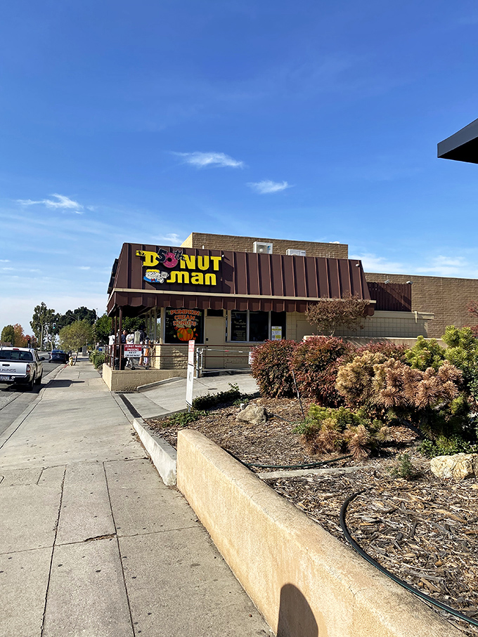Welcome to donut paradise! The Donut Man's unassuming exterior hides a world of sweet wonders, proving you should never judge a book by its cover – or a donut shop by its awning.