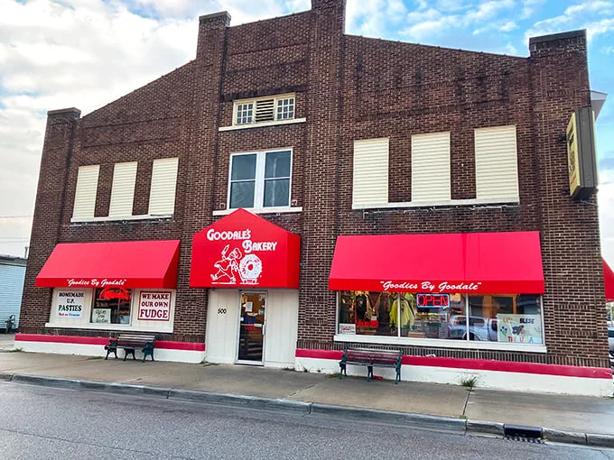 A beacon of baked bliss! Goodale's red awnings beckon like a culinary lighthouse, guiding hungry souls to a haven of homemade pasties and sweet treats.