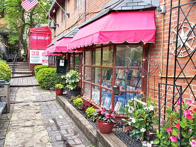 Step into a storybook world! The Book Loft's charming exterior promises literary adventures behind its brick façade and vibrant red awnings.