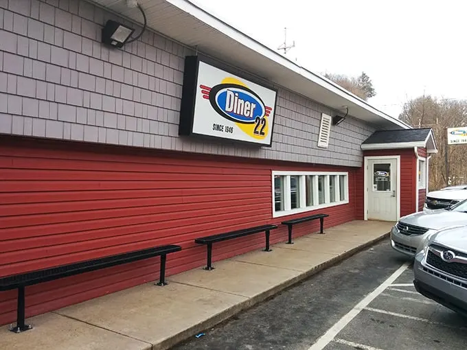 Welcome to flavor town! This cozy red exterior isn't just a diner, it's a portal to comfort food paradise.