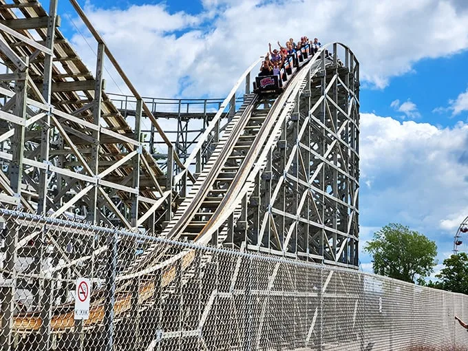 Hold onto your cheese curds, folks! This wooden behemoth is about to take you on a ride smoother than a well-aged cheddar.