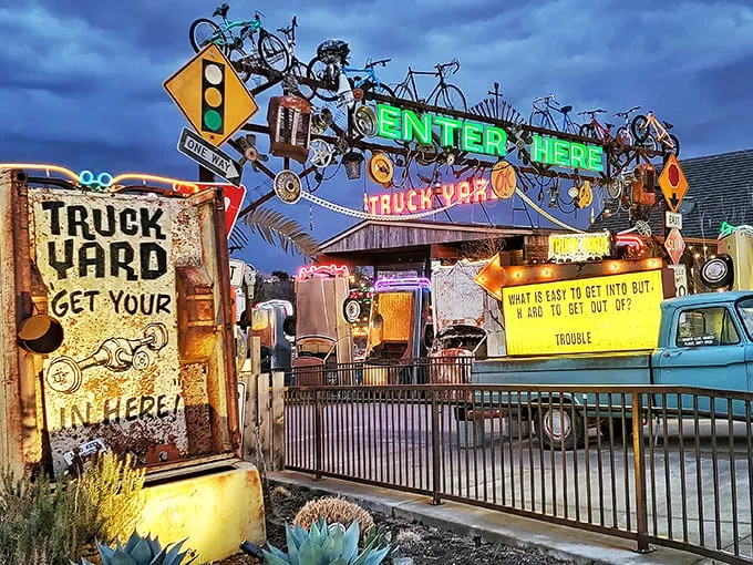 Welcome to Truck Yard, where junk becomes art and fun is always on the menu! This eclectic entrance sets the tone for a truly unique Texas experience.