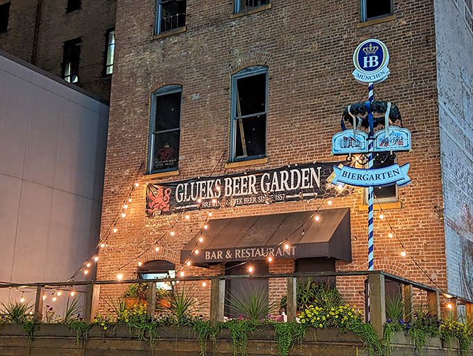 Step into a time machine disguised as a beer garden! Gluek's facade glows with old-world charm, promising a night of Gemütlichkeit and frothy steins.