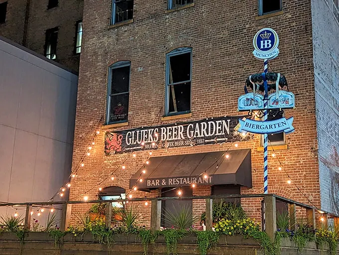 Step into a time machine disguised as a beer garden! Gluek's facade glows with old-world charm, promising a night of Gemütlichkeit and frothy steins.