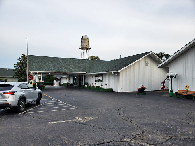 Welcome to chicken paradise! White Fence Farm's charming exterior promises comfort food bliss with a side of nostalgia.