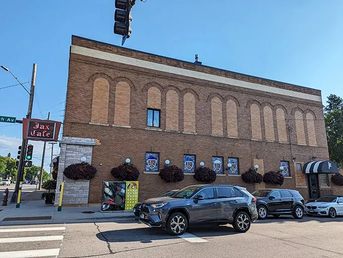A brick facade that's seen more stories than a librarian's book club. Jax Cafe stands proud, its vintage sign a beacon for hungry souls seeking comfort and class.