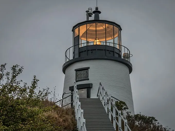 Sentinel of the sea, this lighthouse stands tall against a moody sky. It's like Maine's version of the Eiffel Tower, but with more fish stories.