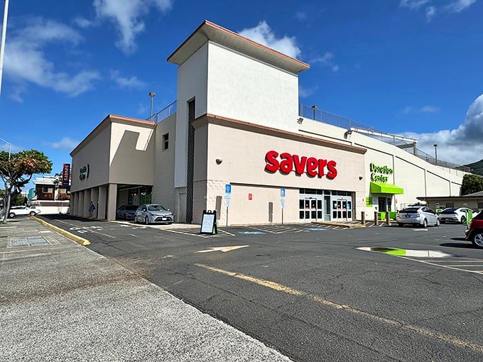 Welcome to bargain paradise! Savers' exterior promises a treasure trove of deals, nestled between palm trees and parked cars. It's like a retail oasis in the urban jungle.