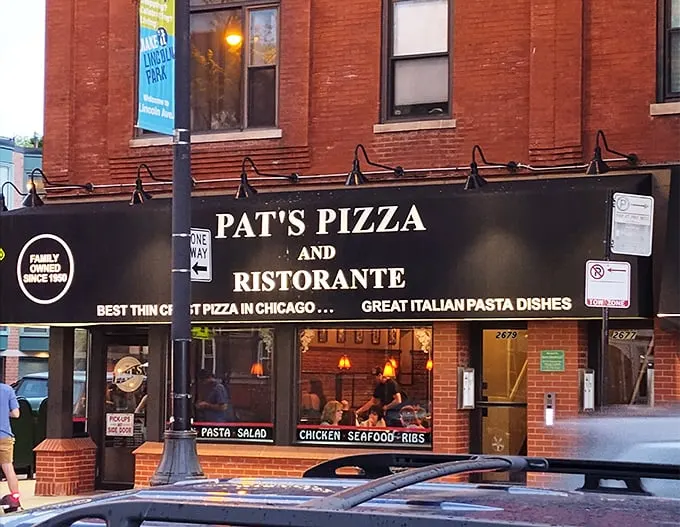 "Welcome to pizza paradise!" Pat's Pizza and Ristorante beckons with its classic neon sign, promising a slice of Chicago history and a whole lot of cheesy goodness.