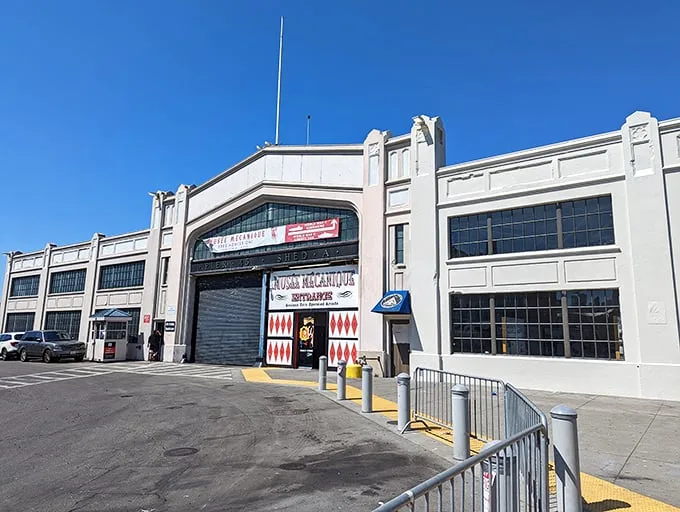 Step right up, folks! The Musée Mécanique's entrance is like a portal to a bygone era of entertainment. Red diamonds and vintage lettering promise a world of mechanical wonders waiting inside.