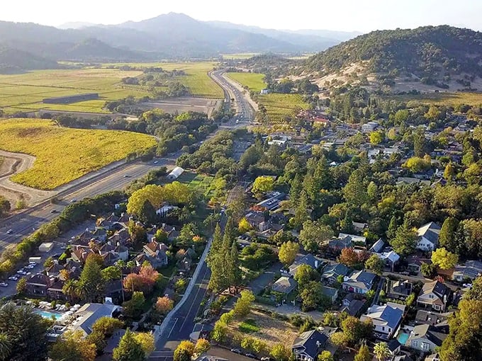 Yountville: Where vineyards meet village charm! This aerial view showcases the perfect blend of small-town coziness and world-class wine country splendor.
