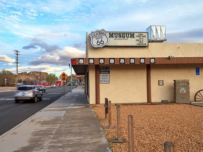 Welcome to the Mother Road's memory lane! This vibrant sign beckons travelers to a time capsule of Americana, where neon dreams and chrome fantasies come alive.