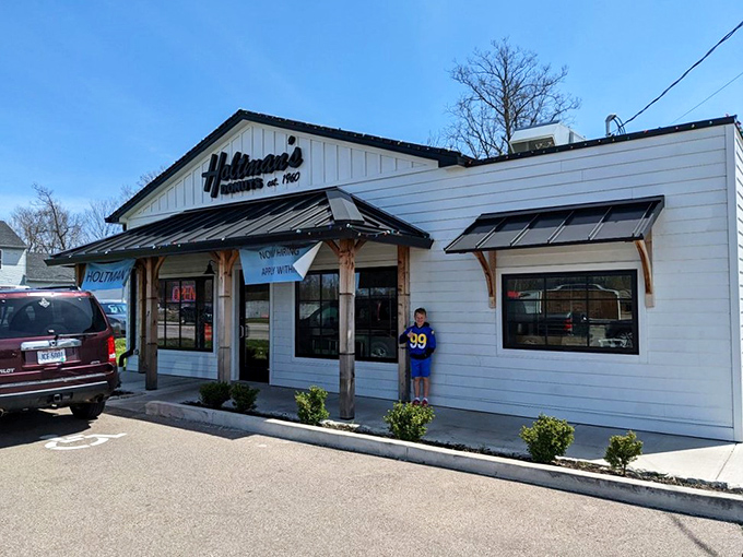 A slice of donut heaven on Earth! Holtman's charming exterior promises sweet delights within, like a modern-day Willy Wonka's factory for the circular confection connoisseur.