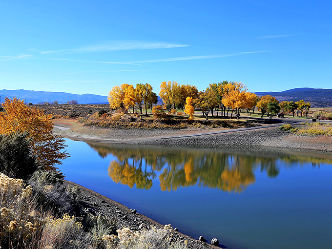 Mirror, mirror on the lake! Unity Lake's glassy surface reflects the sky like nature's own Instagram filter.