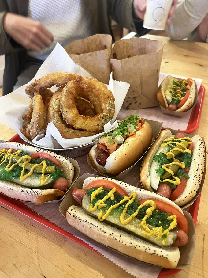 Chicago dogs, Michigan style! These loaded beauties are like the Rat Pack of hot dogs – cool, classic, and always in demand.