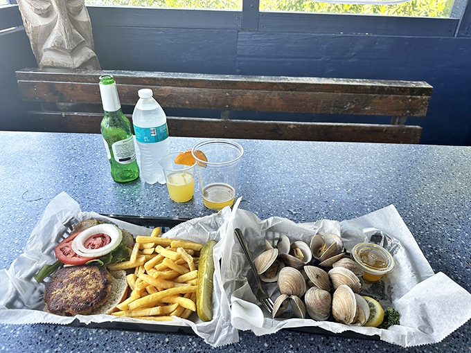 A dynamic duo that'll make your taste buds sing! The crab cake sammie and steamed clams are like the Beyoncé and Jay-Z of seafood.