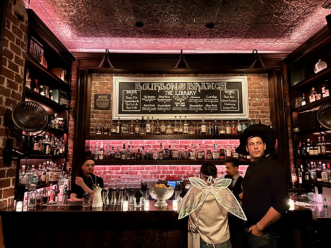 Cheers to new friends! The bar's warm glow sets the scene for lively conversations and prohibition-style shenanigans.