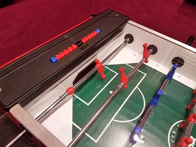 Foosball face-off! This table football game might be miniature, but the competition is anything but small. Game on!