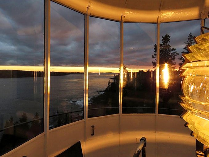 Golden hour glory: Inside the lantern room, sunset transforms the lighthouse into a kaleidoscope of warm, dreamy hues.