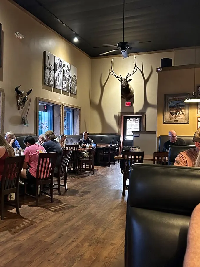 Where everybody knows your steak! This lively dining room scene could be a modern-day "Cheers" – if Norm ordered ribeye instead of beer.