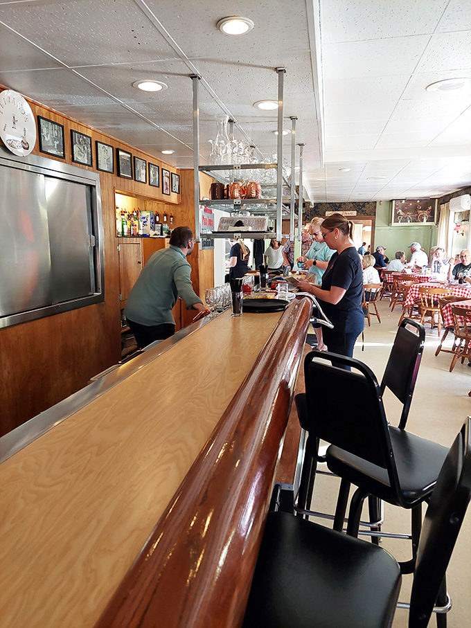 Where the magic happens! The bustling bar is like a pizza command center, orchestrating deliciousness with military precision.