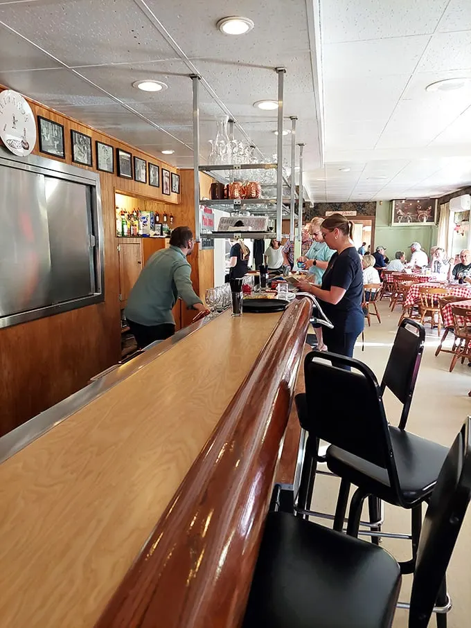 Where the magic happens! The bustling bar is like a pizza command center, orchestrating deliciousness with military precision.