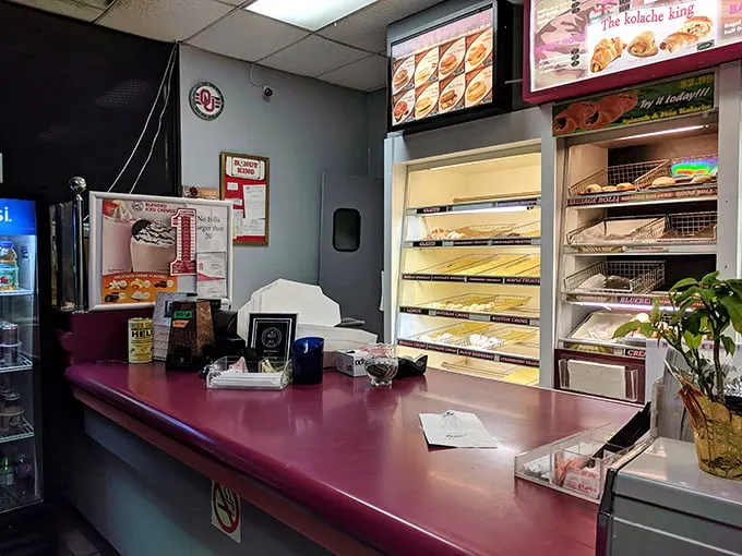 The counter: where dreams come true and diets go to die. A front-row seat to the greatest show on earth – fresh donuts!