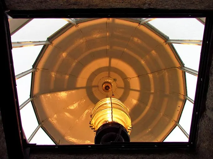 The heart of the lighthouse: its powerful beam. It's like a giant flashlight for ships, only cooler and with more history.