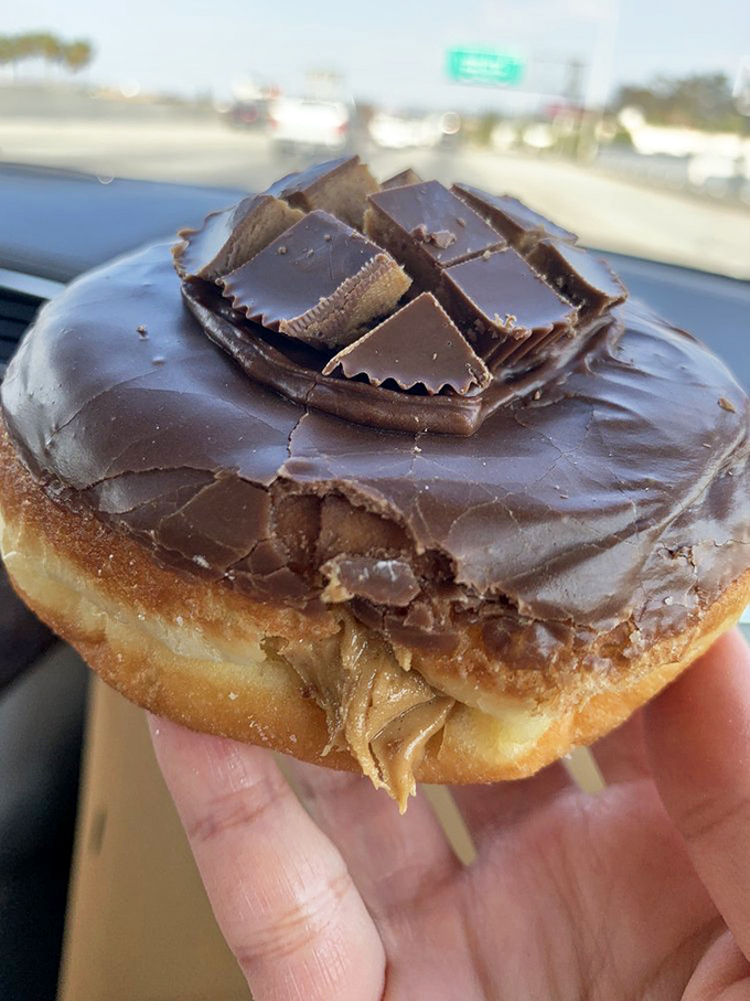 Peanut butter cup meets donut in this match made in dessert heaven. It's like your childhood favorite got a glow-up!