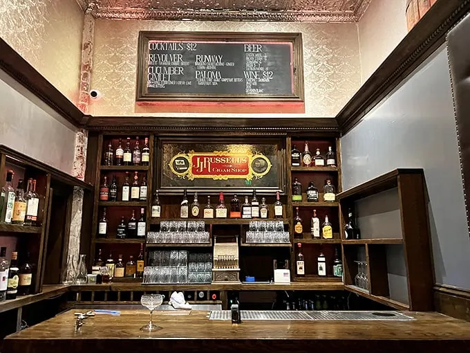 Welcome to libation station! This bar area is stocked like a boozy library, with every spirit imaginable waiting to tell its story.