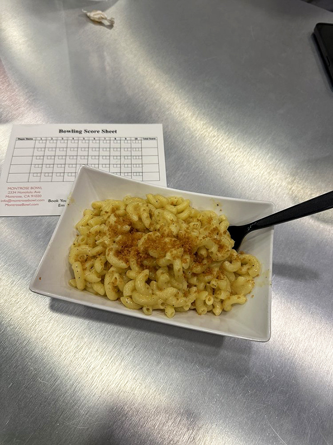 Mac and cheese: the official fuel of bowling champions. Carbs and dairy – a winning combination!