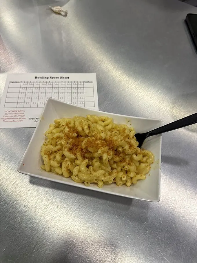 Mac and cheese: the official fuel of bowling champions. Carbs and dairy – a winning combination!