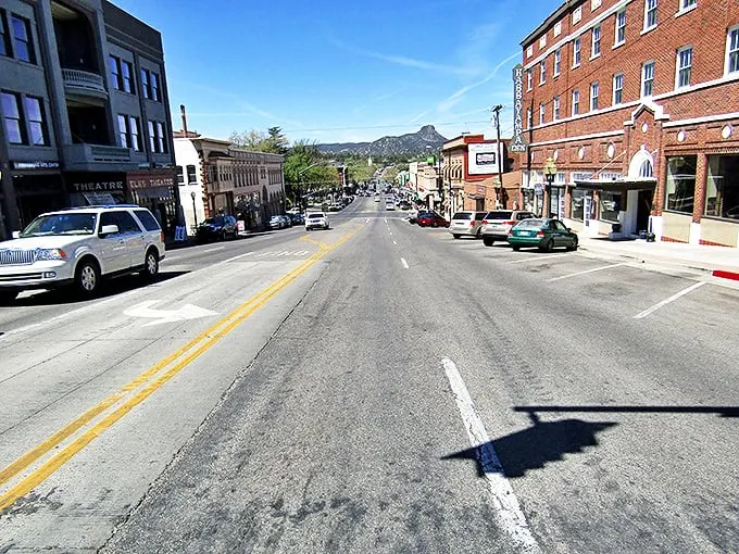 Street view: Where small-town charm meets big mountain views. This street is like a postcard come to life – no filter needed.