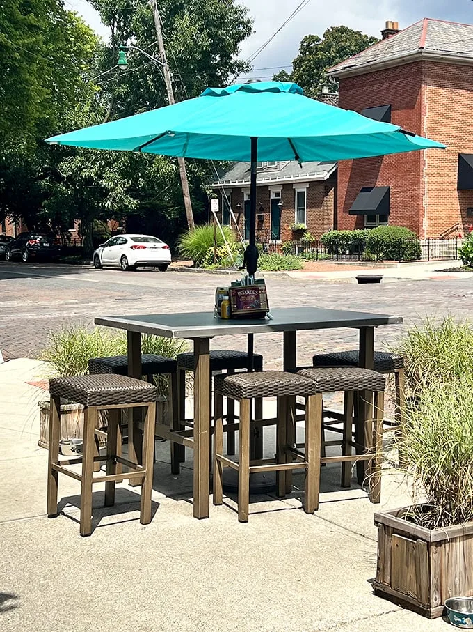 Al fresco dining with a side of people-watching. This outdoor setup is perfect for soaking up the local flavor.