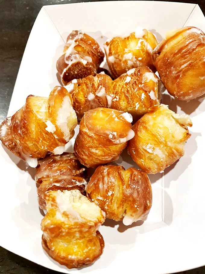 Behold, the elusive cronut holes! Part croissant, part donut, all delicious – it's the pastry world's most delightful identity crisis.