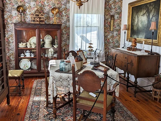 Dinner is served... but who's joining? This dining room's dressed to impress, whether you're hosting the living or the dead.